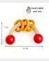 Buy Ariro Wooden Rattle Curvy with Rings in Qatar - AlaneesQatar.Qa